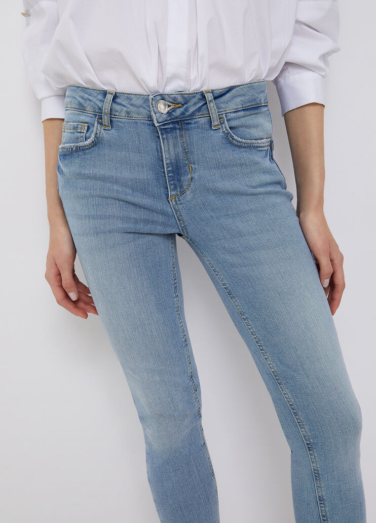 Skinny jeans with pouch bag